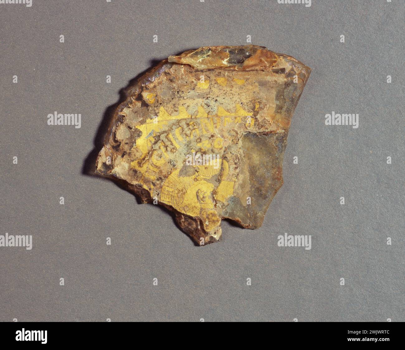 Anonymous. "Cup fragment: feminine face". White glass with gold ...