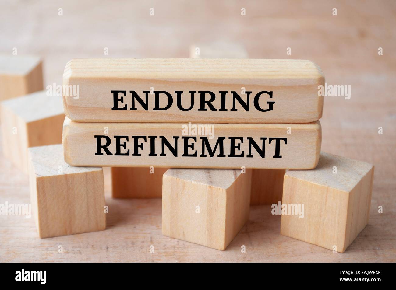 Enduring refinement text on wooden blocks. Operational excellence ...