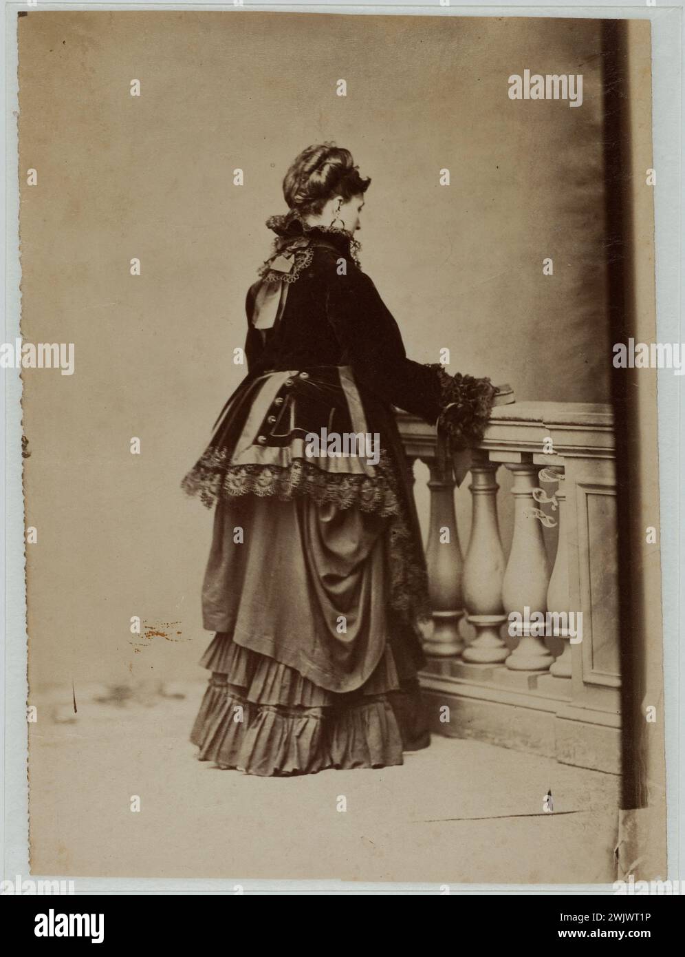 3/4 back woman leaning on a balustrade. 1870-1875. Anonymous ...