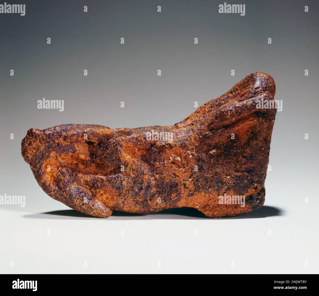 Anonymous. "Lion lying devouring an animal". Amber. -600/500 BC ...