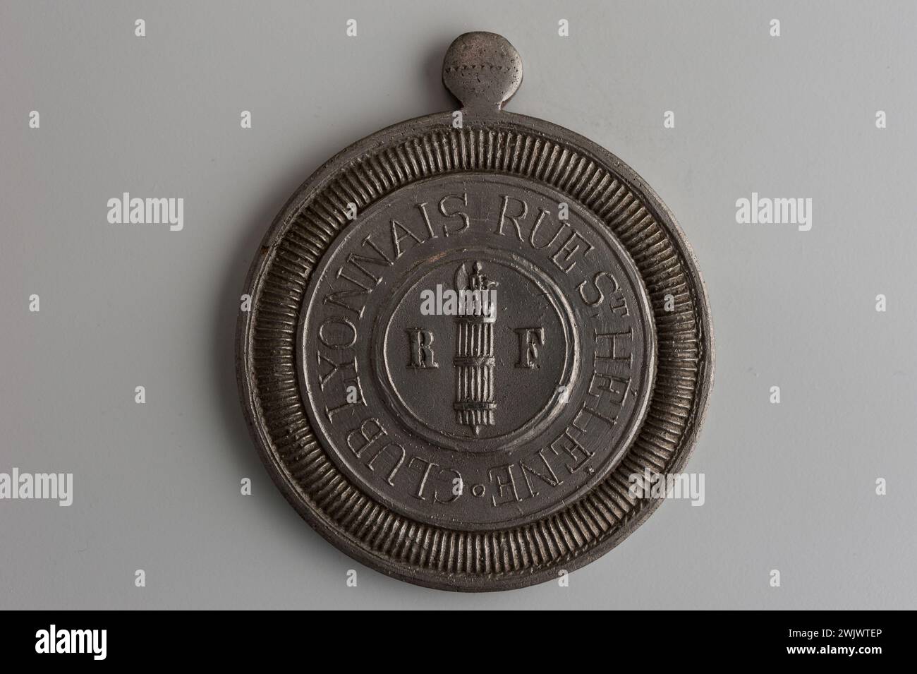 Carnavalet museum, medal collection Right a beam of a lictor posed in ...