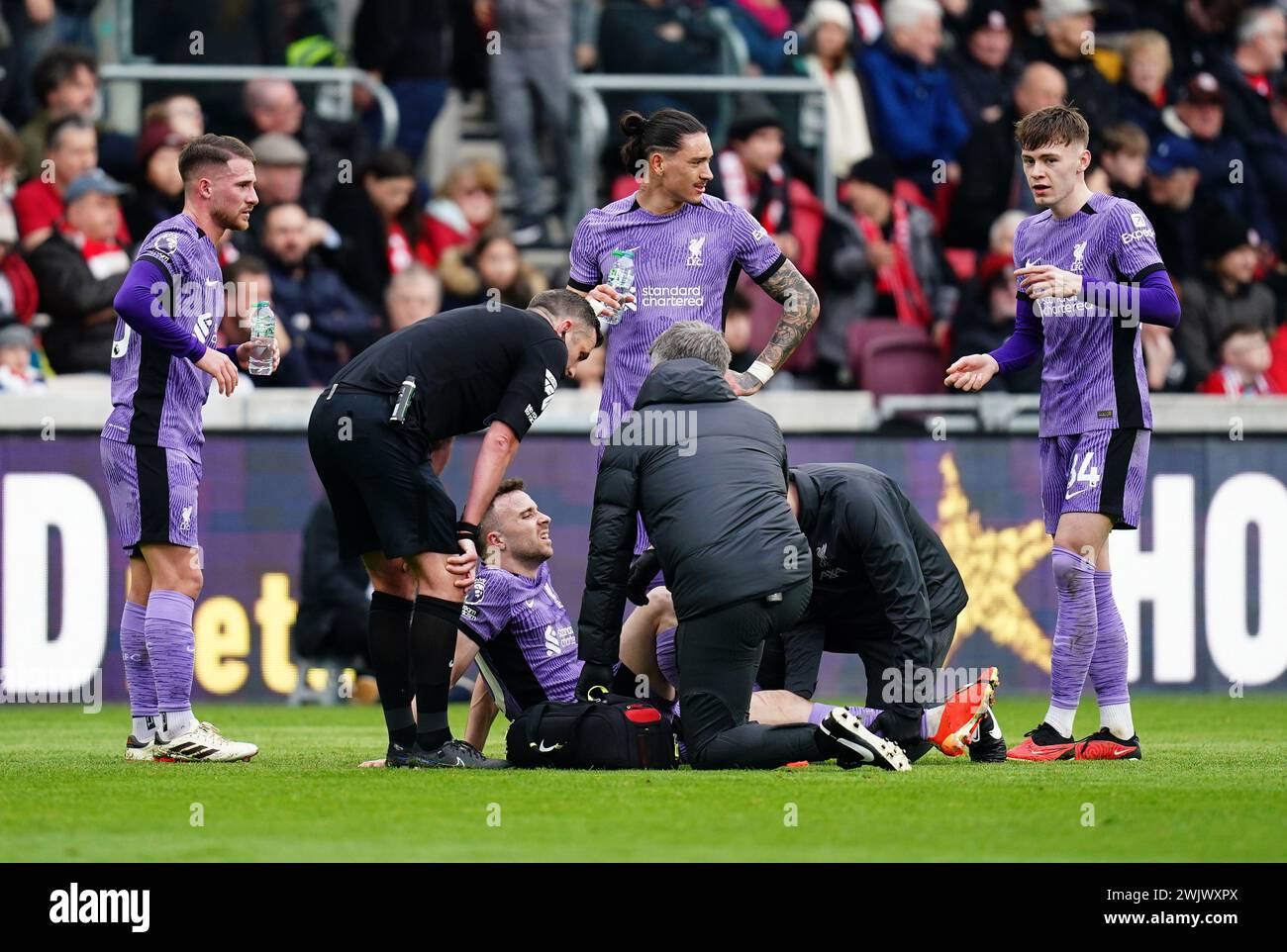 Liverpool's Diogo Jota lies injured after picking up an injury during ...