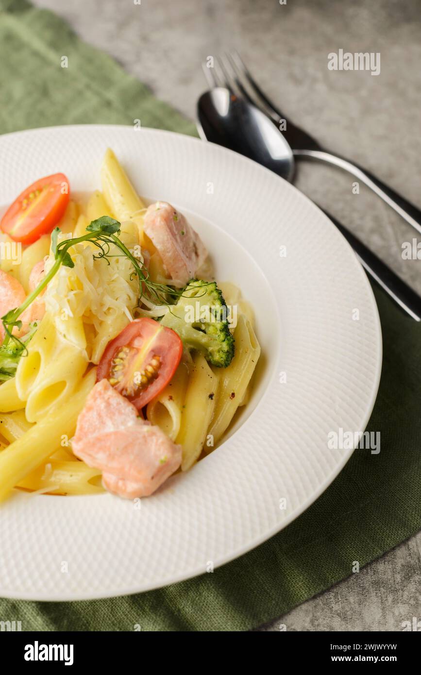 penne with salmon in the restaurant. High quality photo Stock Photo - Alamy