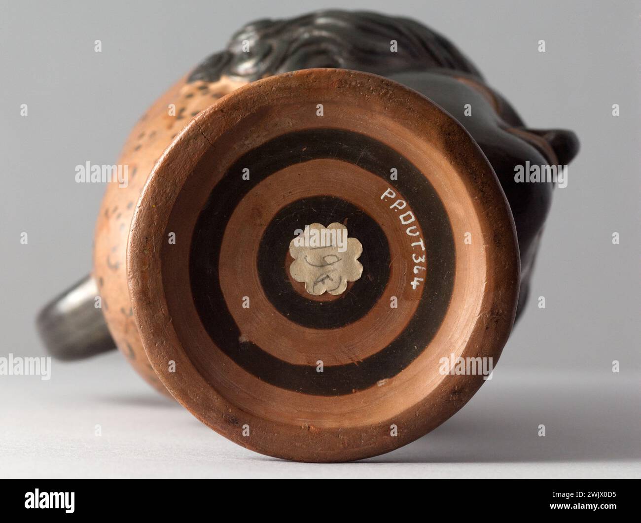 Woman's head -shaped vase. Object created by the Falisque people. Italy ...