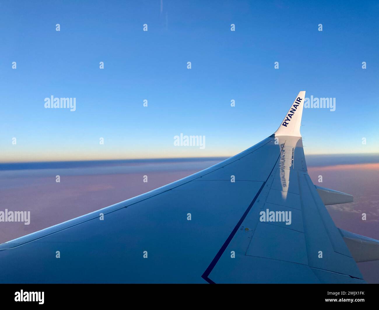 View from Boeing 747 on a RyanAir flight. Airplane wing Stock Photo - Alamy