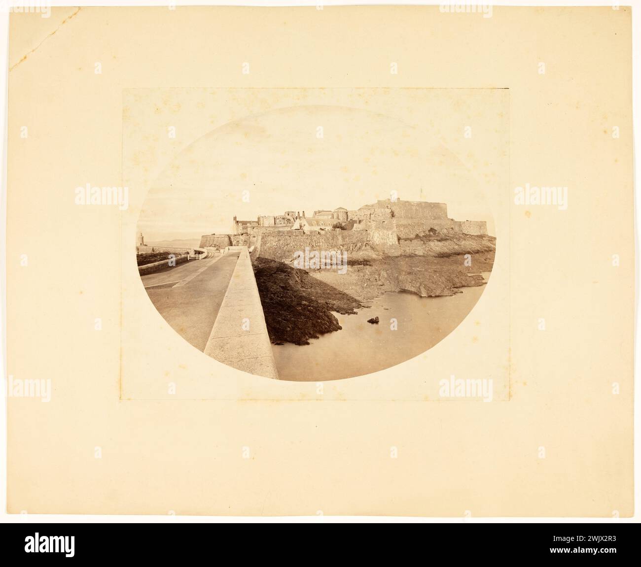 Anonymous. "The dike and the Cornet castle in Guernsey". Albumin paper ...