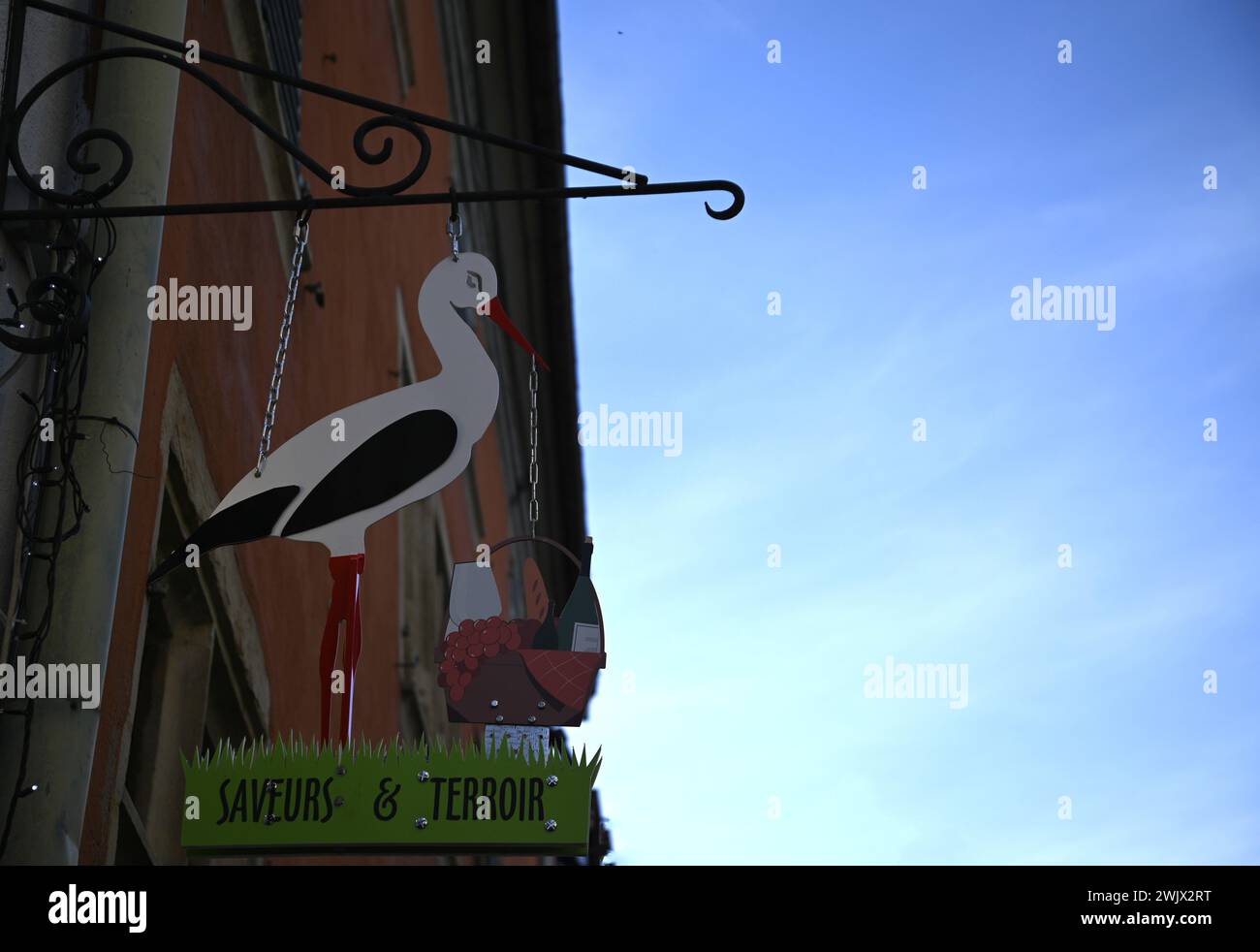 Rustic stork sign in Turckheim Alsace, France Stock Photo - Alamy