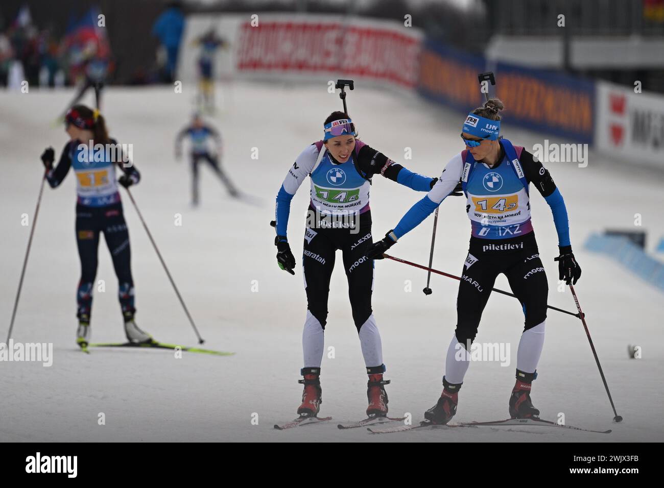 From left Estonian biathletes Regina Ermits, Tuuli Tomingas in action ...
