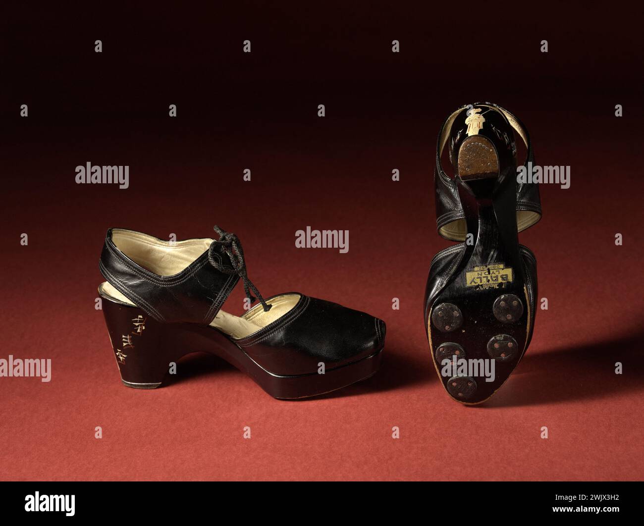 Bally Lyon. Pair of open -end black leather sandals; lacing at the ...