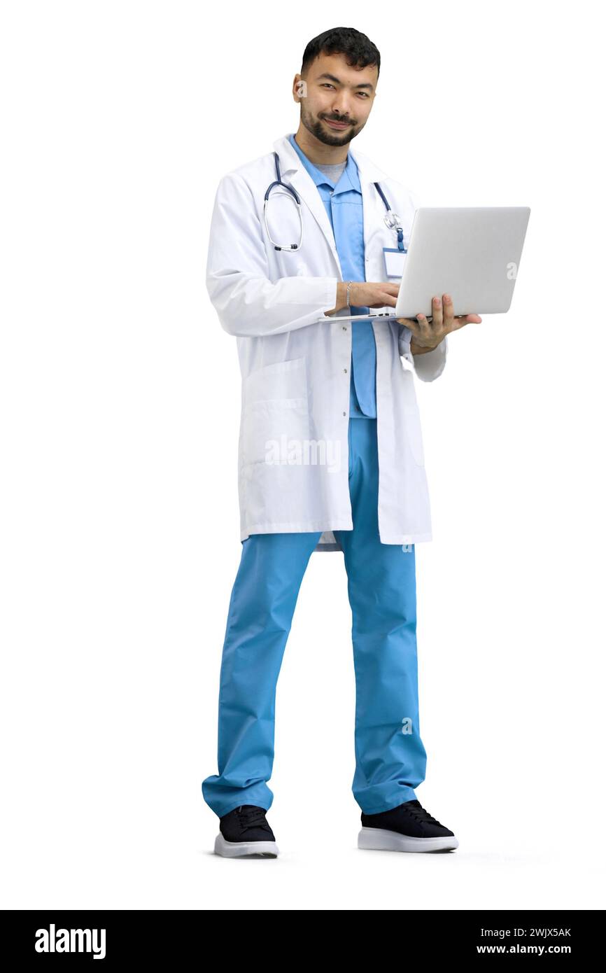 Doctor, full-length, on a white background, with a laptop Stock Photo ...