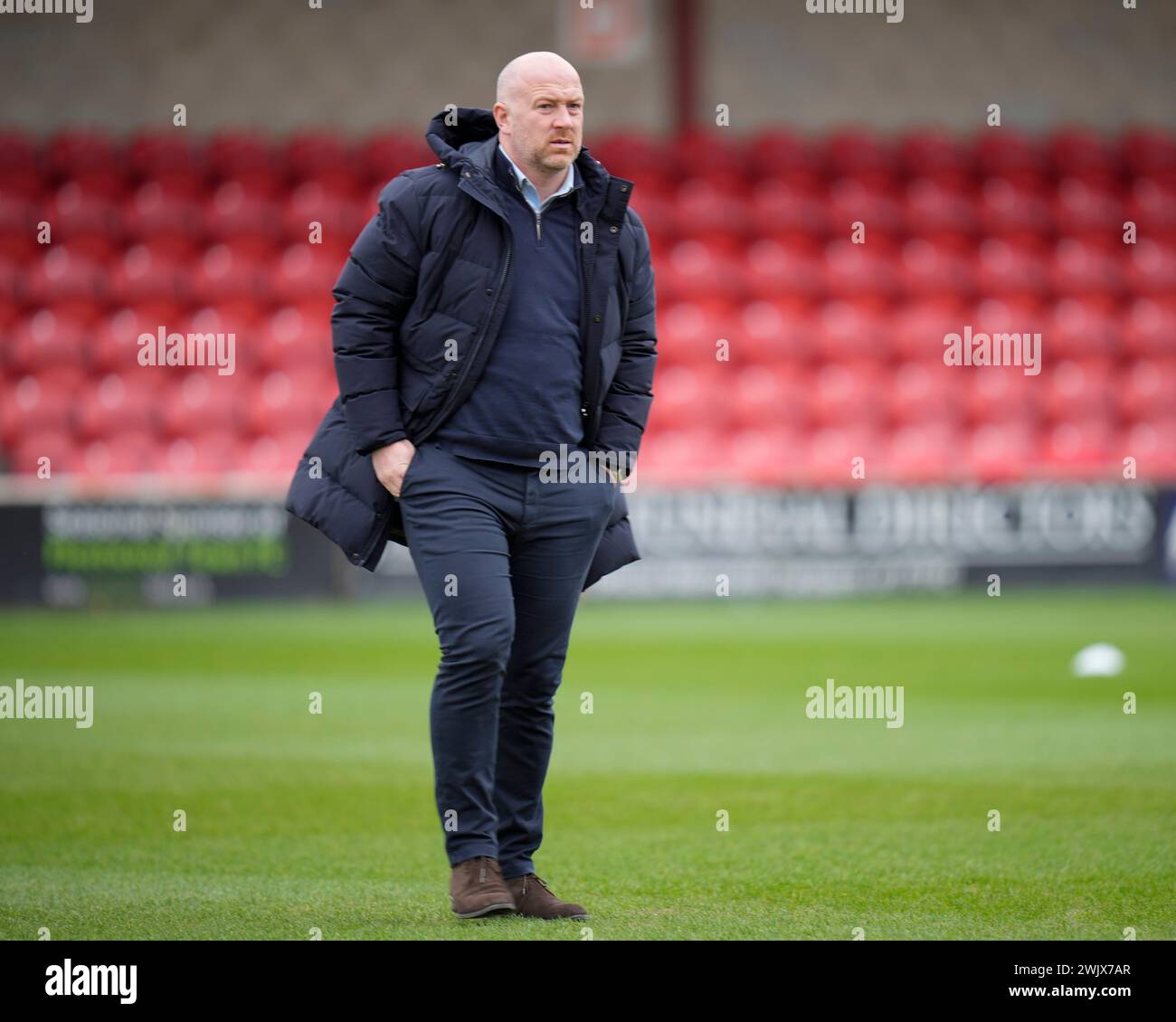 Charlie Adam, manager of Fleetwood Town inspects the pitch before the ...