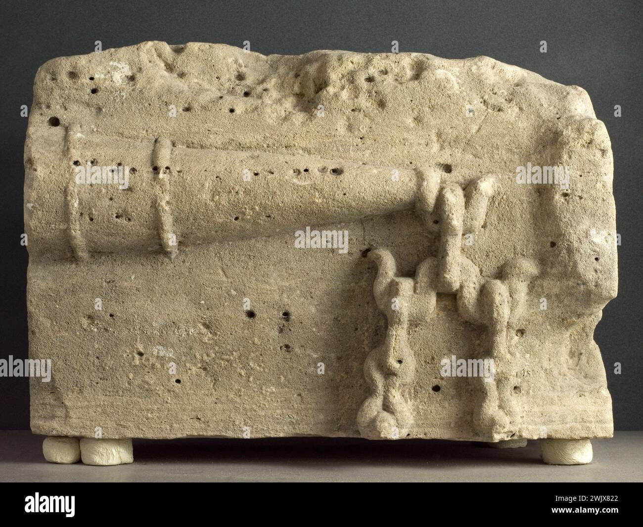 Limestone block with representation of a balance arm. Gallo-Roman time ...