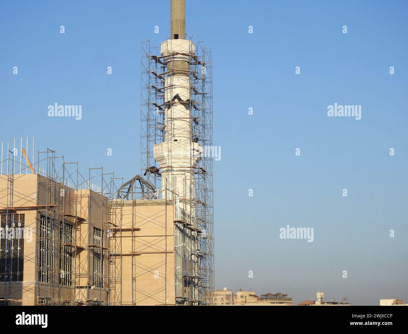 Cairo, Egypt, January 6 2024: A construction site of a new mosque with ...