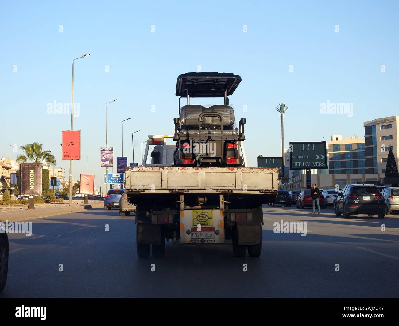 Cairo, Egypt, February 1 2024: A tow recovery transporter hydraulic ...