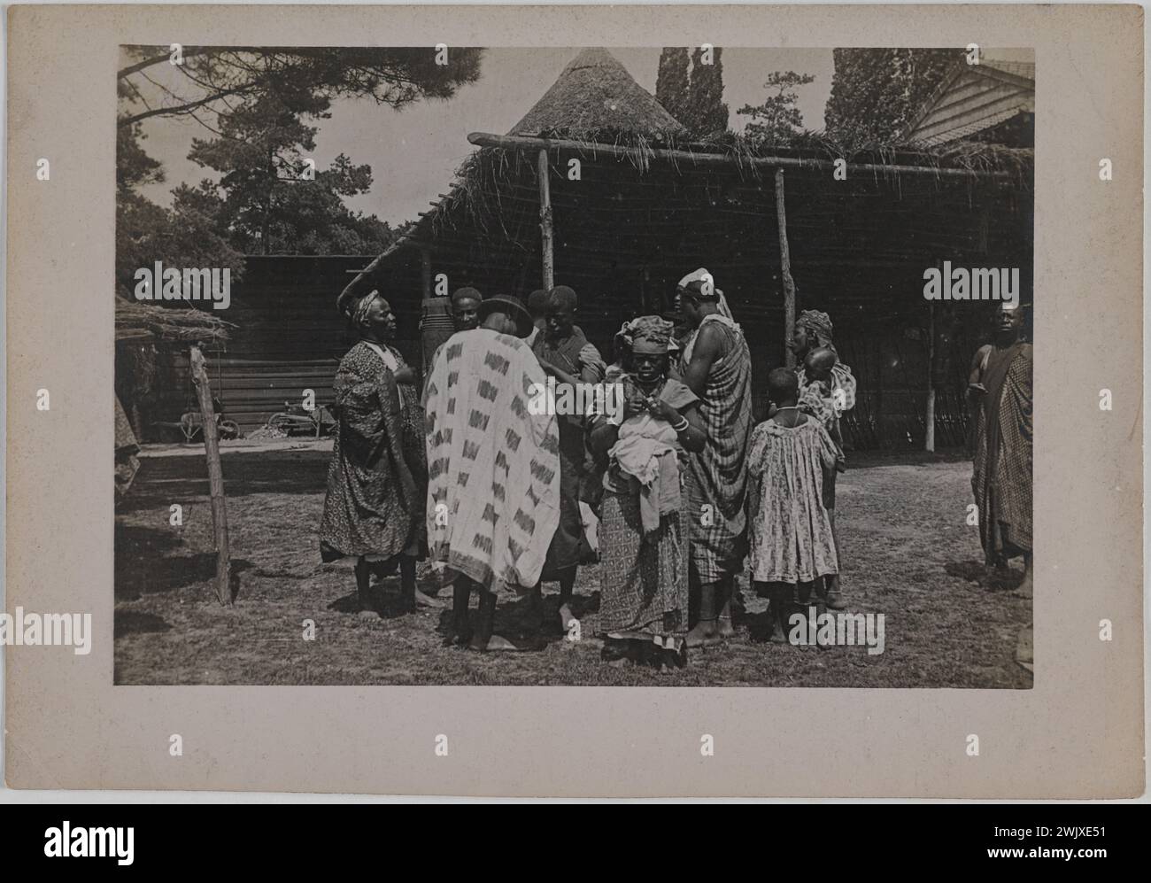 Group of Africans in traditional habit, acclimatization garden, Bois de ...
