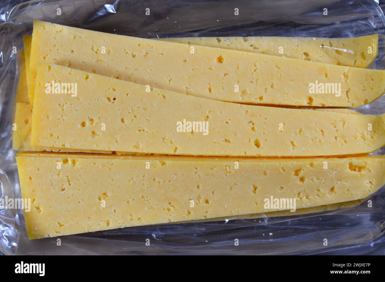 Slices of Egyptian Rumi cheese, also called gebna romiya or gebna ...