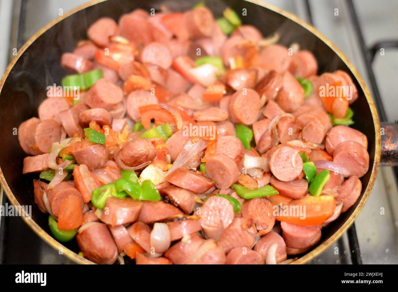 Slices hot dog grilled beef sausage called wiener (Vienna sausage) and ...