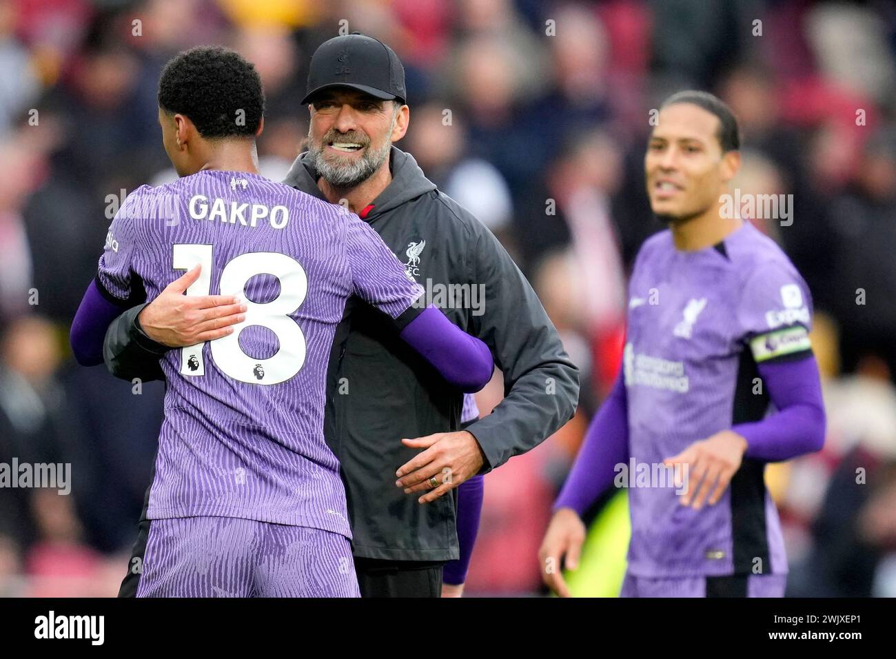 Liverpool's manager Jurgen Klopp hugs Liverpool's Cody Gakpo as he ...