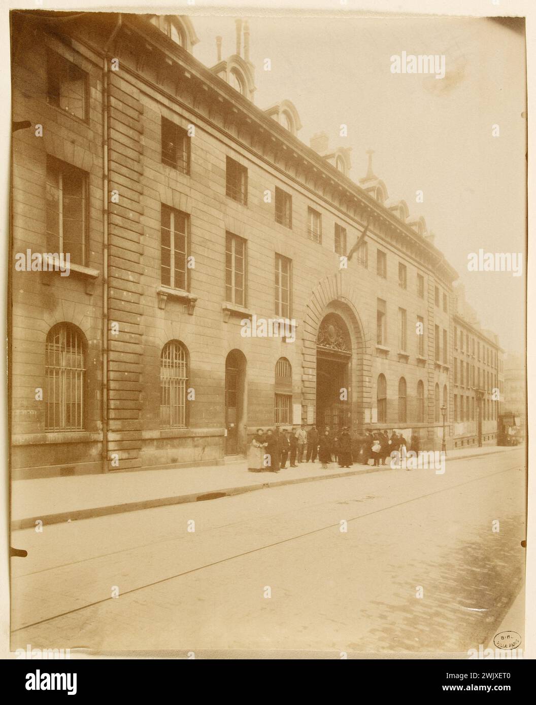 Group of people in front of an official building, Paris (10th arr ...