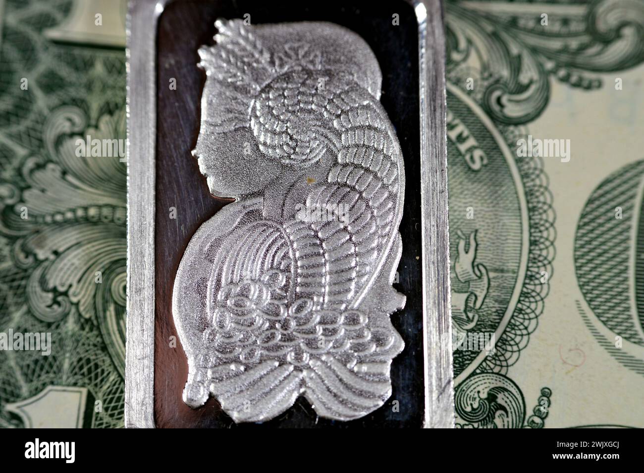 USD American dollars cash money and silver precious metal ounce bar of ...