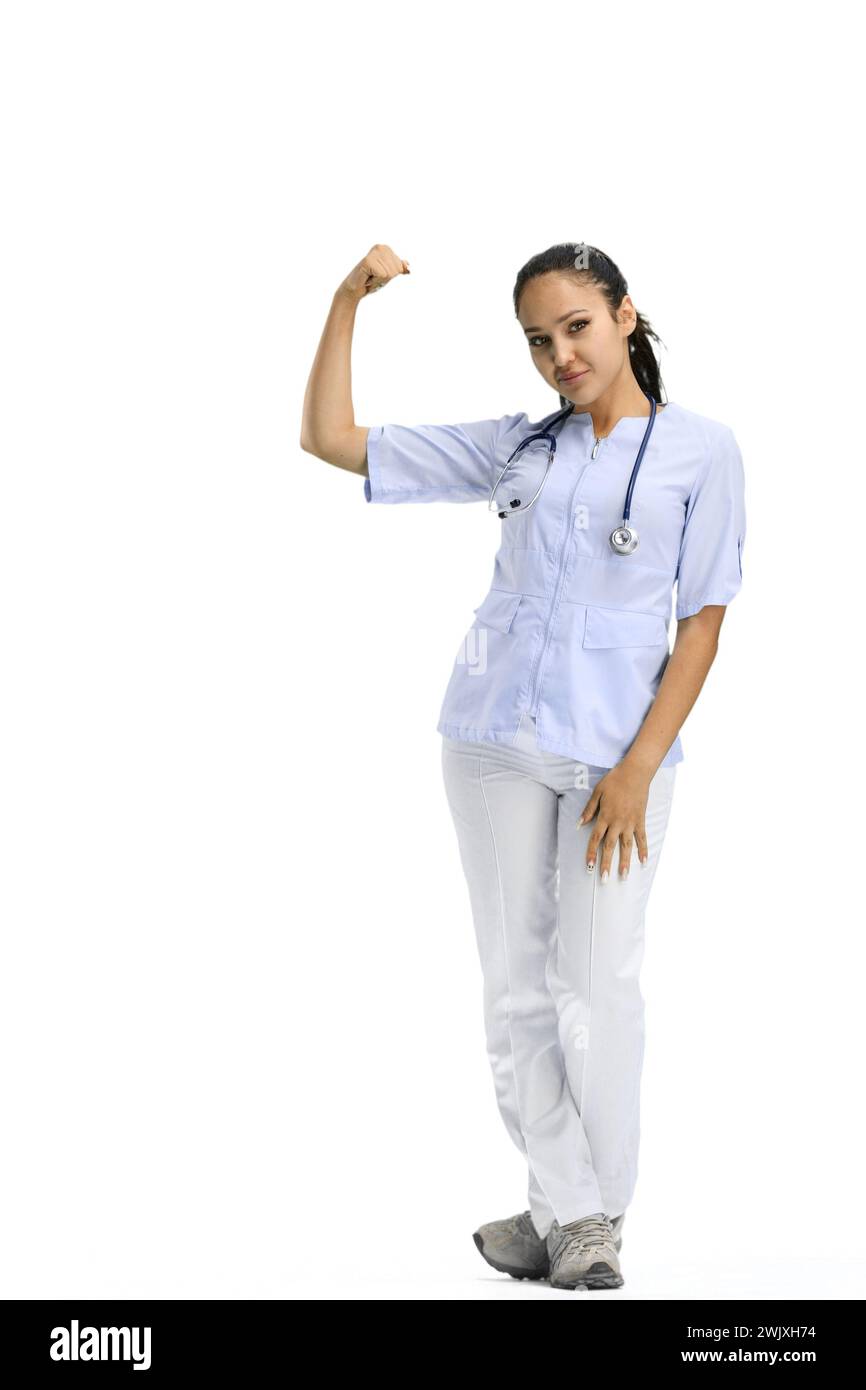 Female doctor, full-length, on a white background, shows strength Stock ...