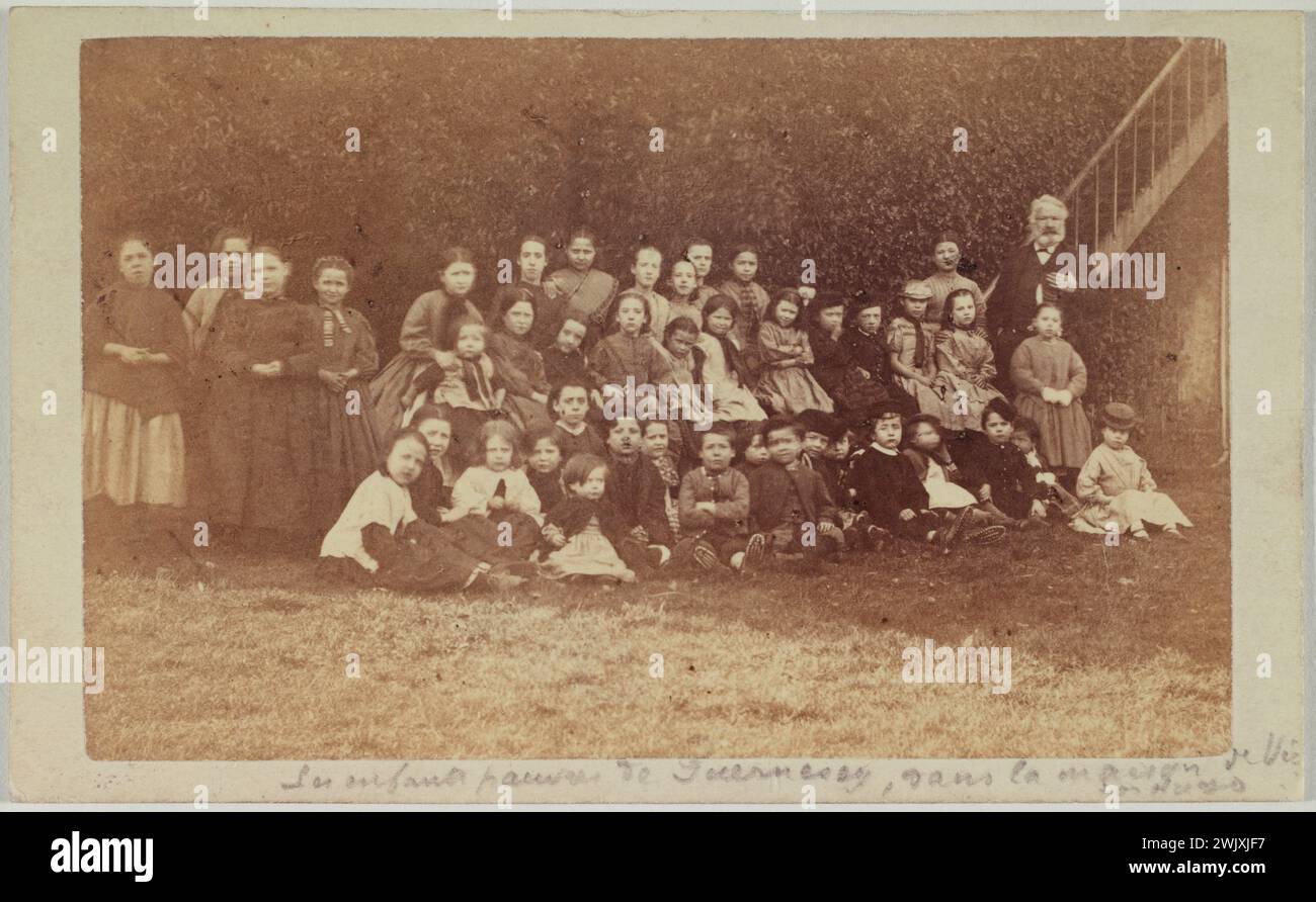 Anonymous. "Victor Hugo and the poor children of Guernsey in the garden ...