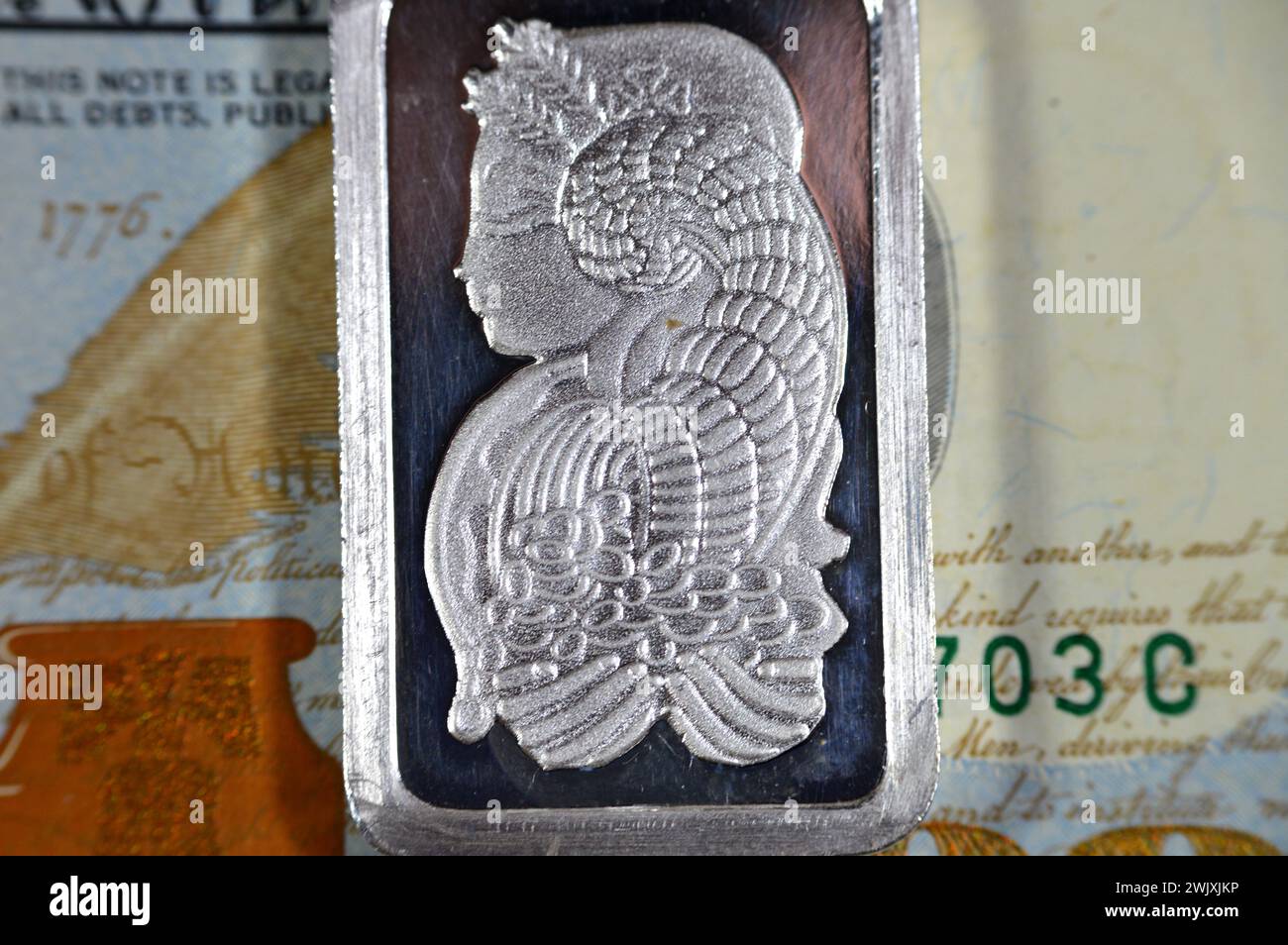 USD American 100 dollars cash money and silver precious metal ounce bar ...