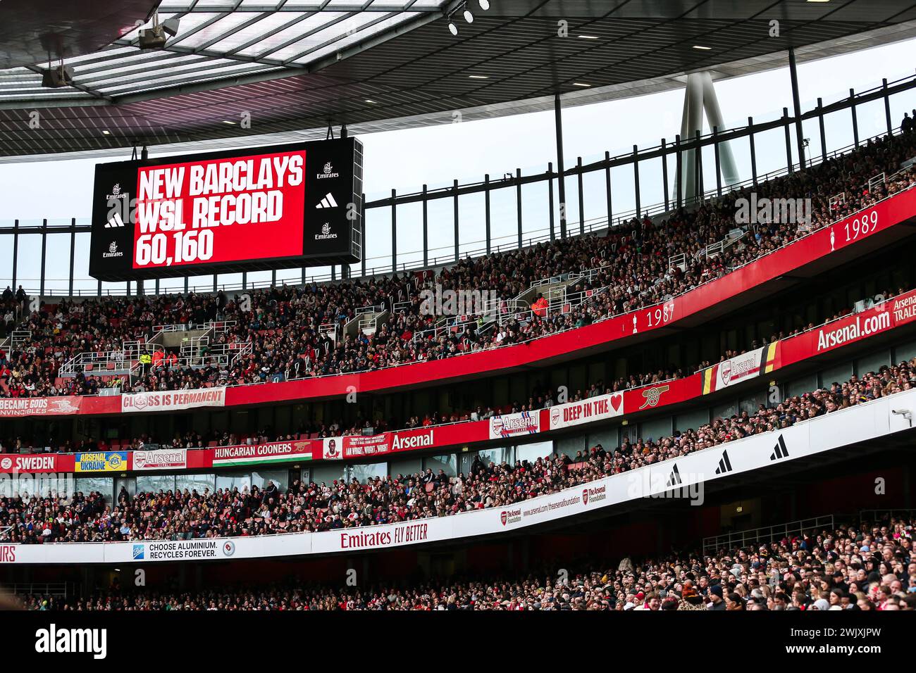 A screen displays crowd at attendance during the Barclays Women's Super ...
