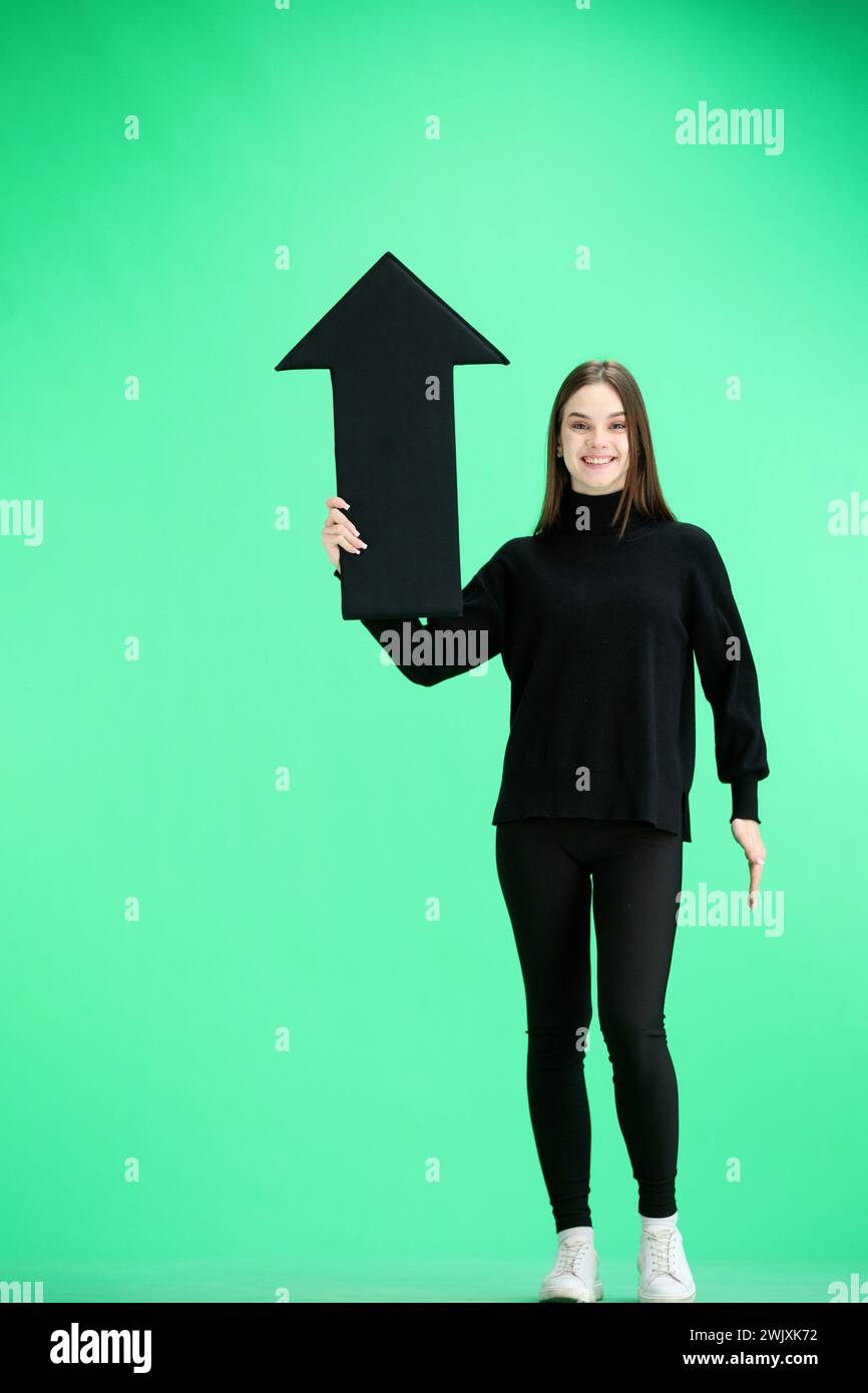 Woman points finger holding red hi-res stock photography and images - Alamy