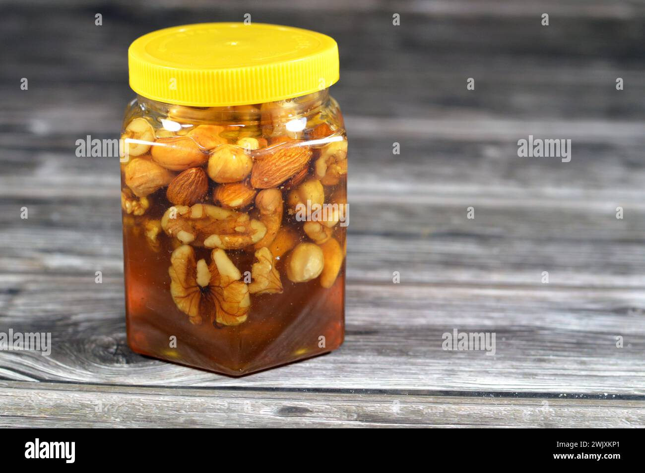 Honey walnut in jar hi-res stock photography and images - Alamy