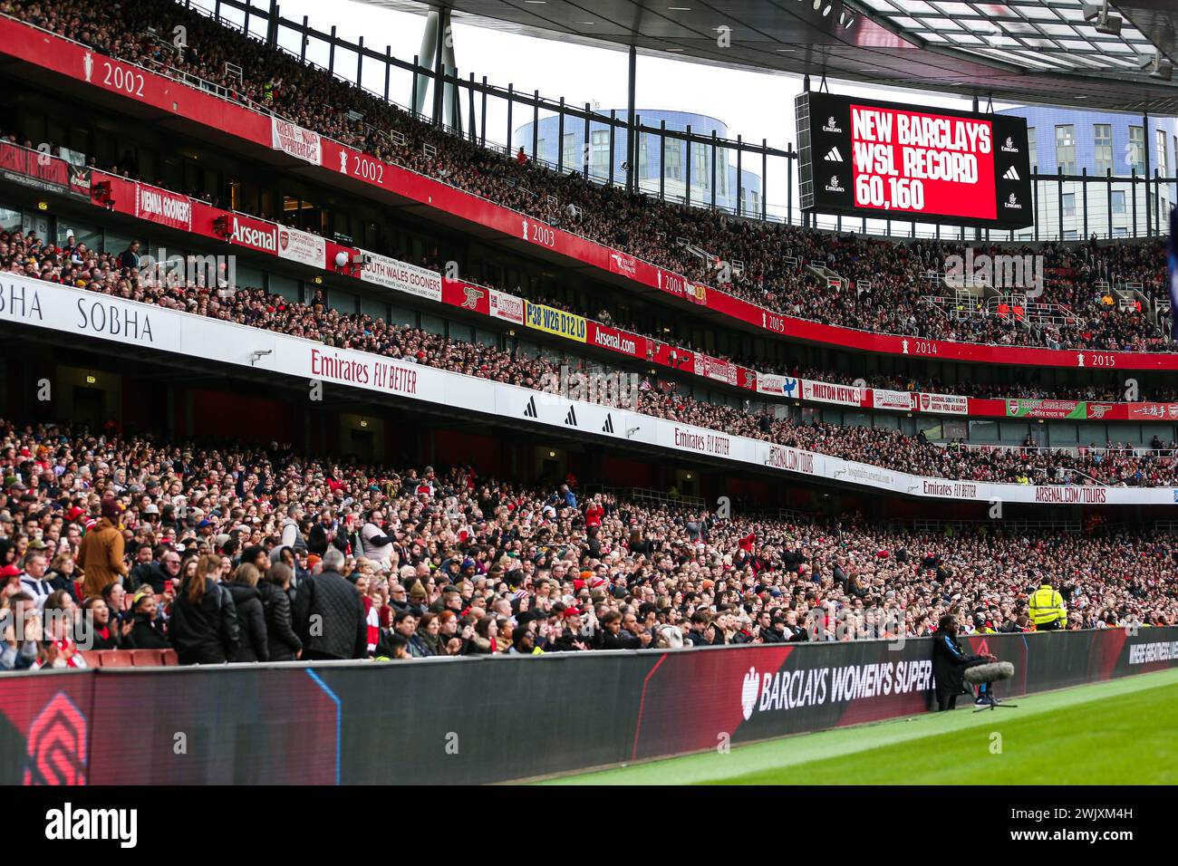 A screen displays crowd at attendance during the Barclays Women's Super ...
