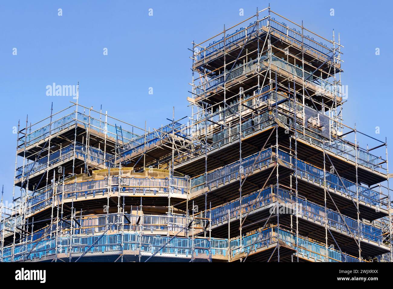 Scaffolding surrounding residential development for safe access to ...