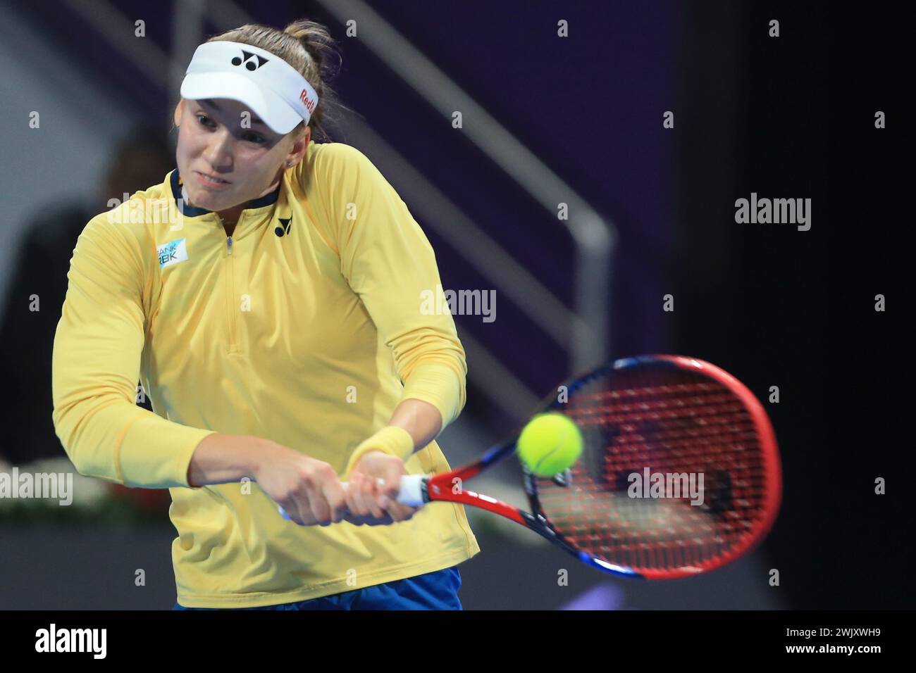 Kazakhstan's Ekaterina Rybakina returns to Poland's Iga Swiatek during ...