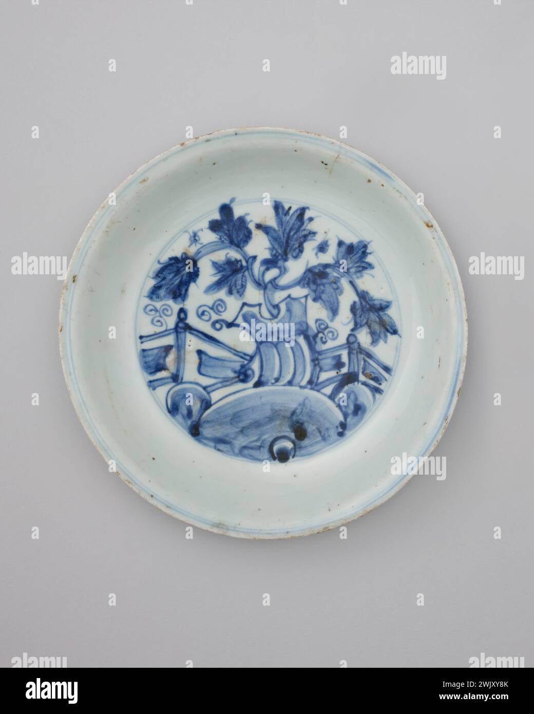 Cut. White paste porcelain, blue-painted decor under white-blue covered ...