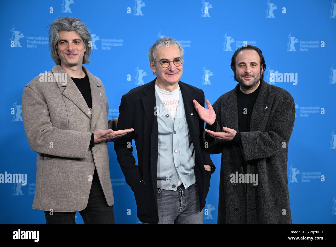 Berlin, Germany. 17th Feb, 2024. Director Olivier Assayas (M) stands ...