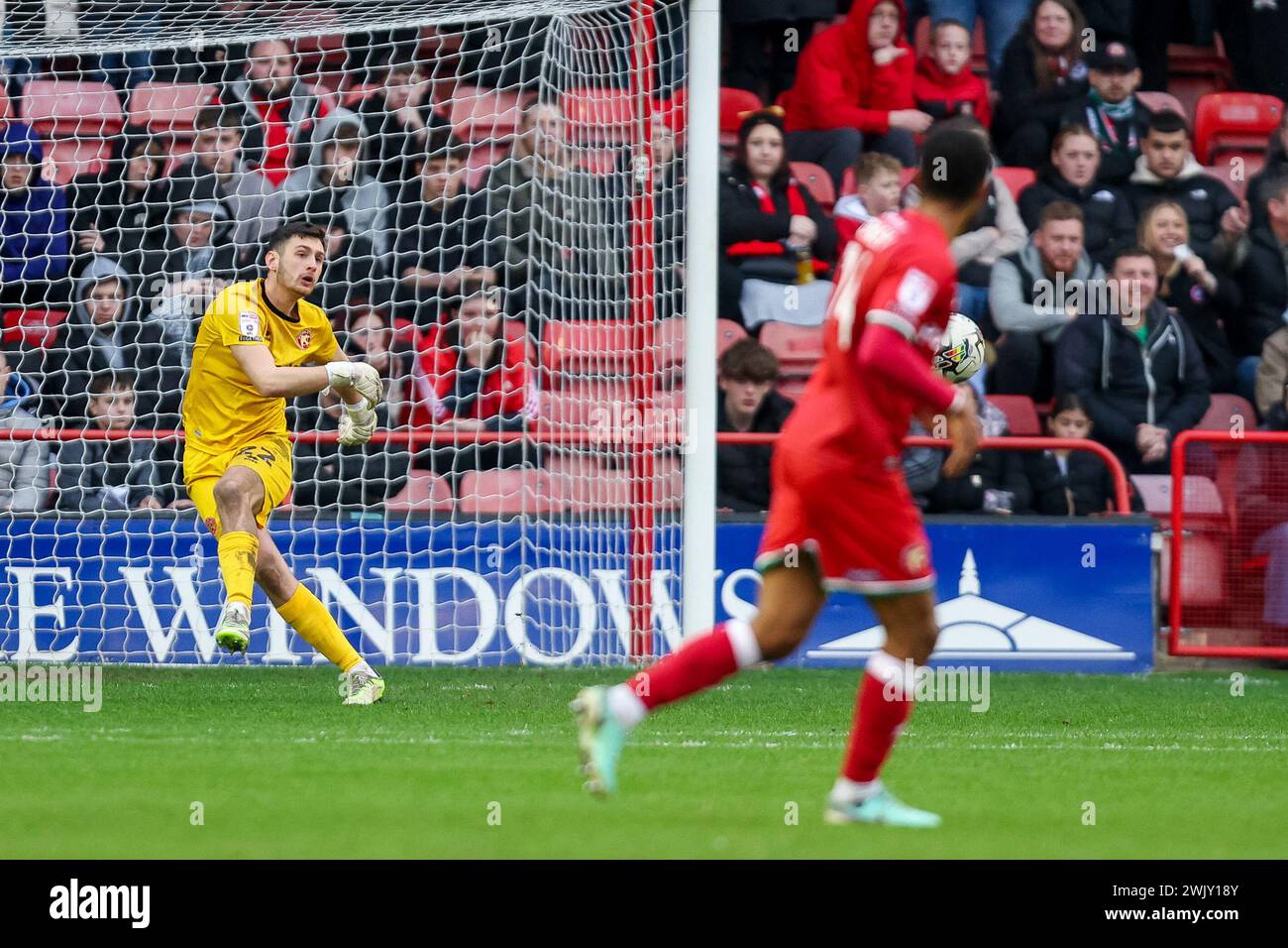Walsall, UK. 17th Feb, 2024. Walsall's goalkeeper, Jackson Smith fires ...