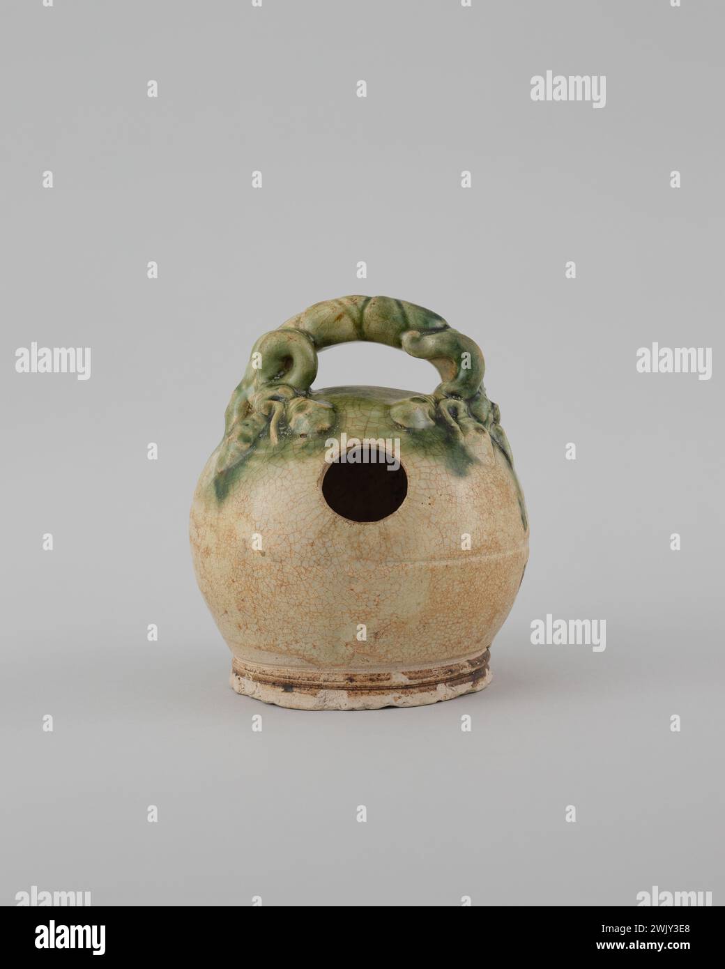 Anonymous lime pot, 1400. White paste, two covered: ivory and green ...
