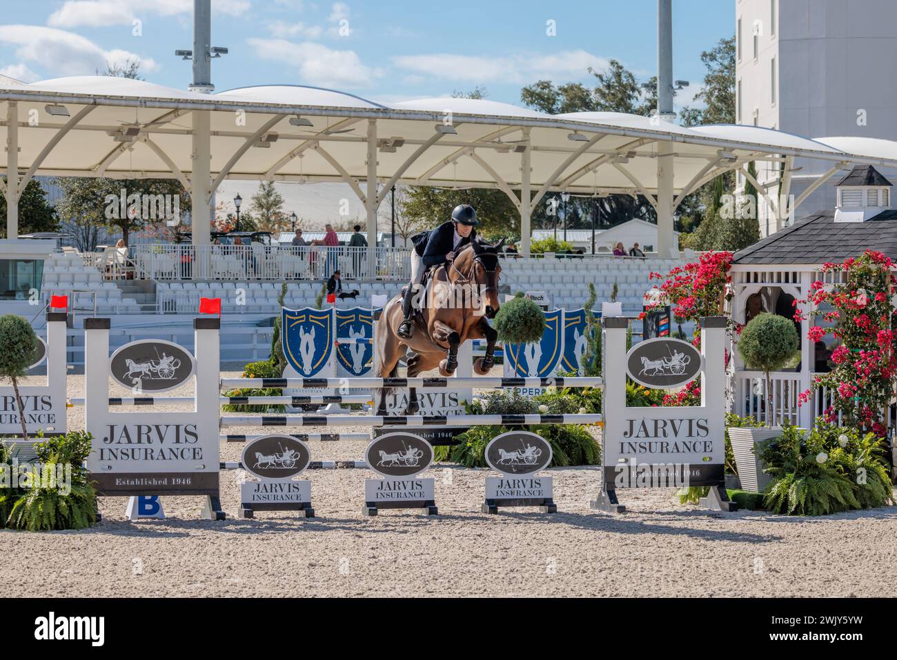 Man competing in the Hunter Jumper competition in the Grand Outdoor ...
