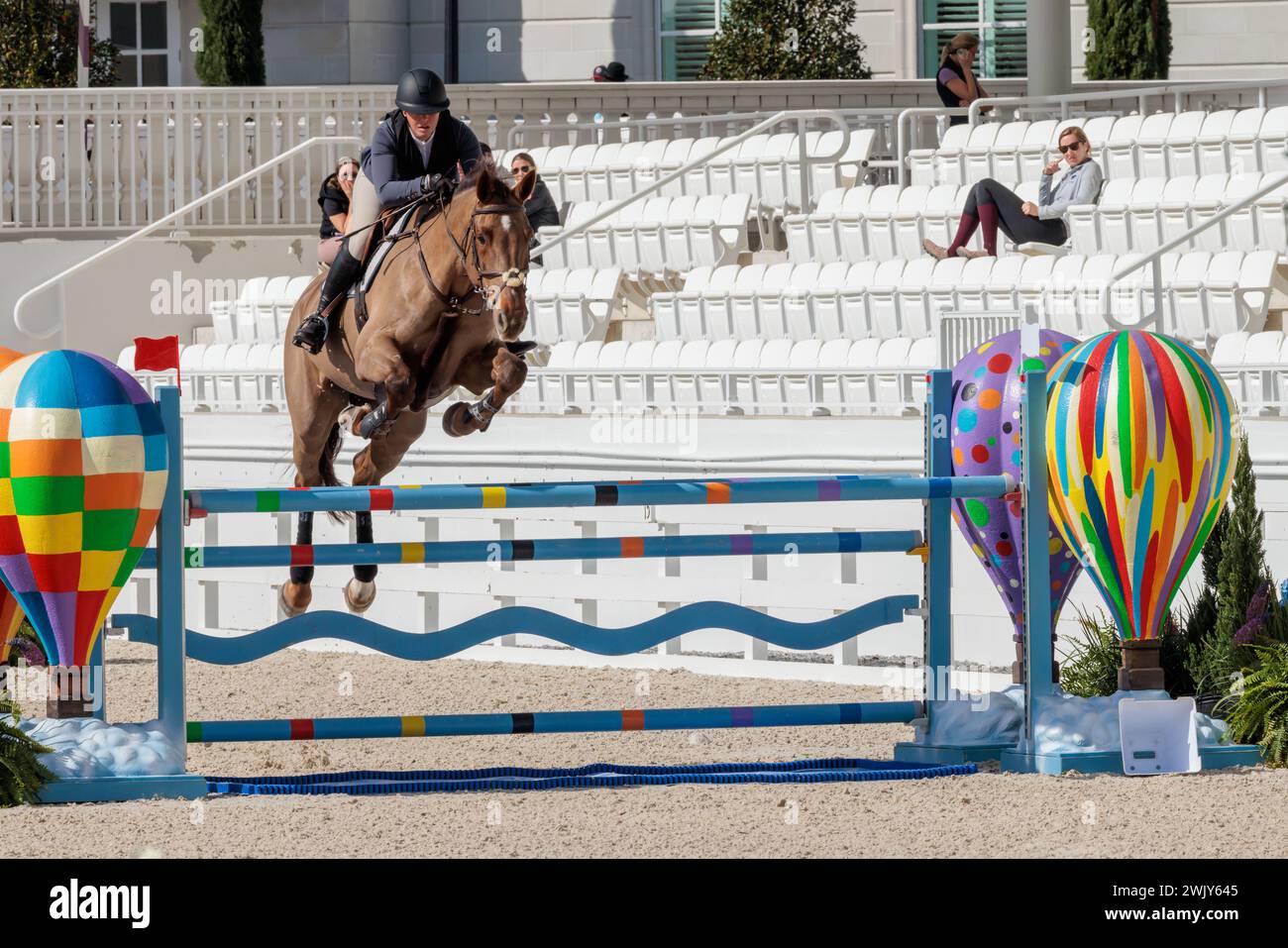 Woman competing in the Hunter Jumper competition in the Grand Outdoor ...