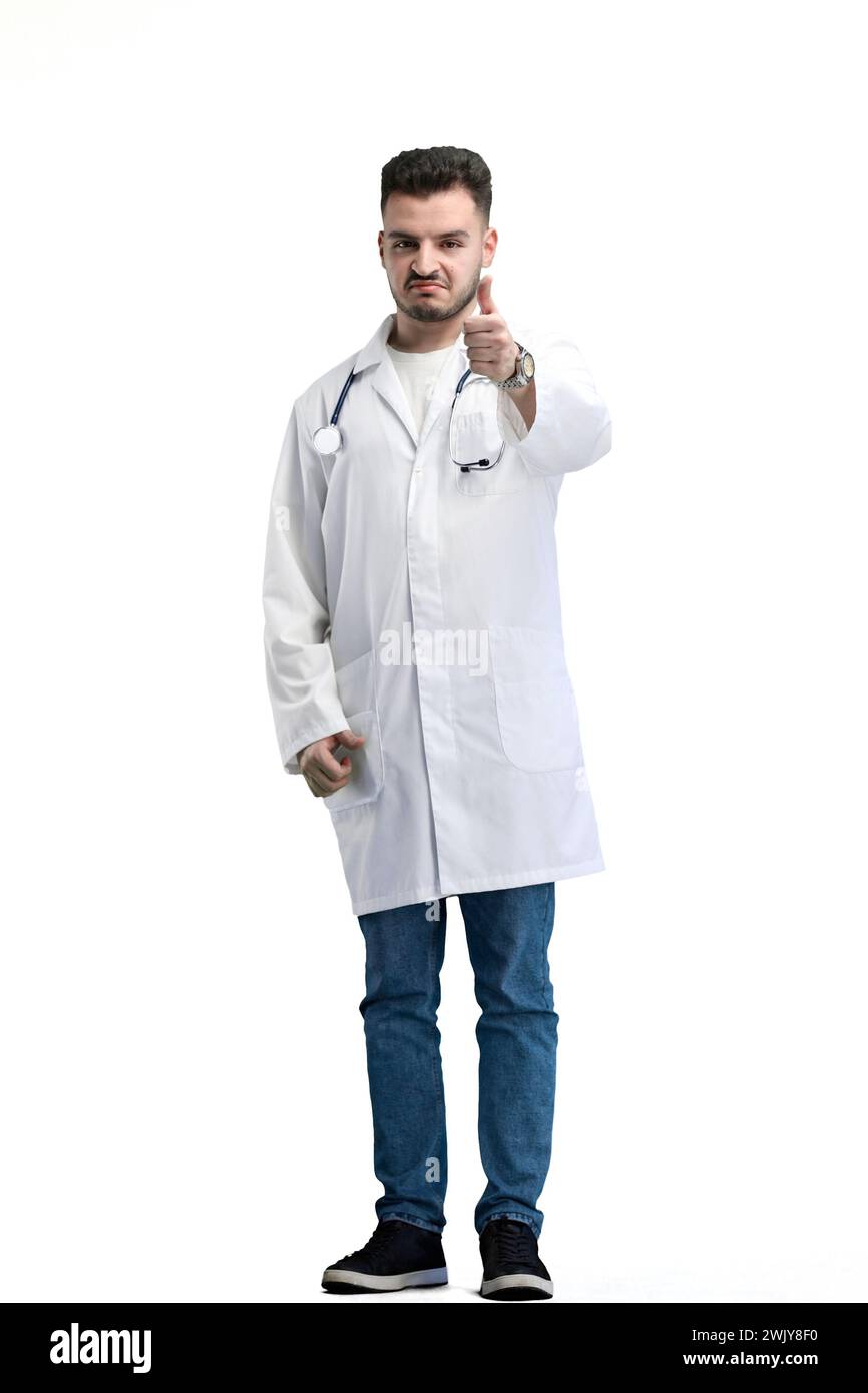 The doctor, in full height, on a white background, shows a thumbs up ...