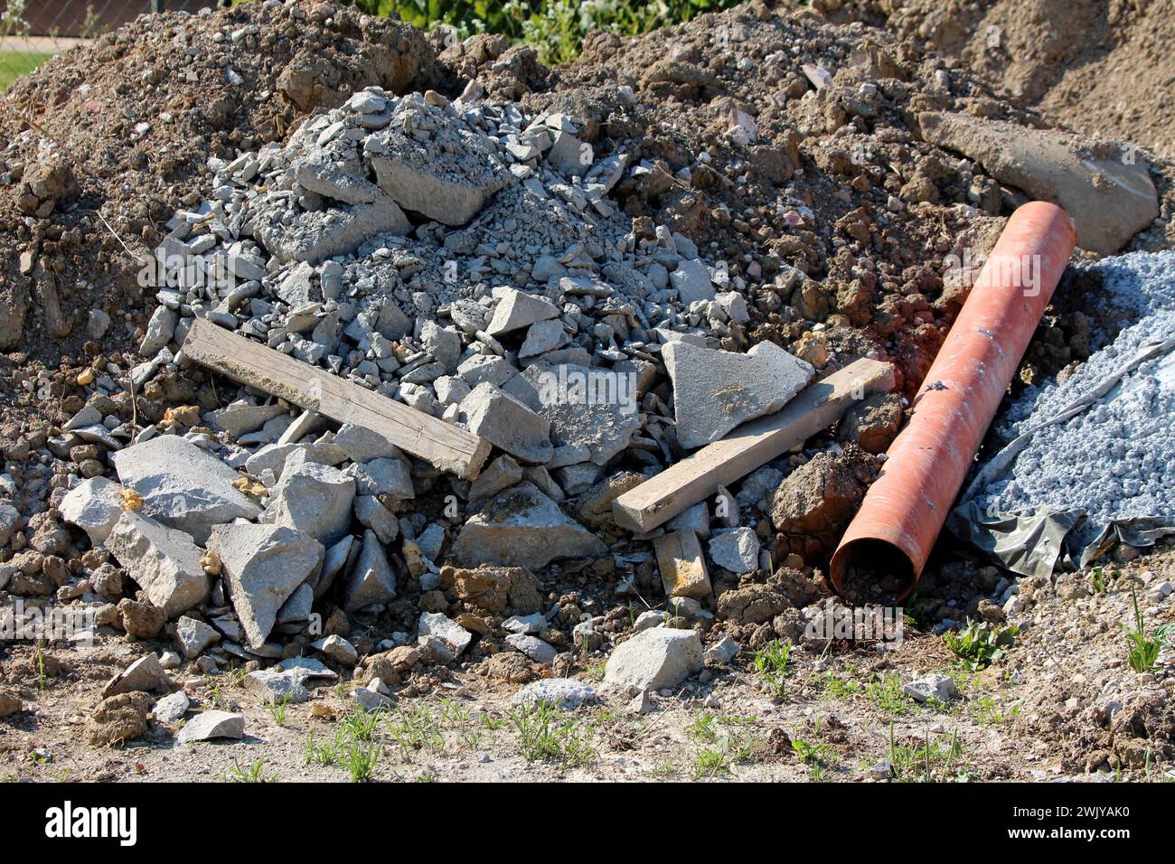 Illegal garbage dump near suburban family house fence filled with ...
