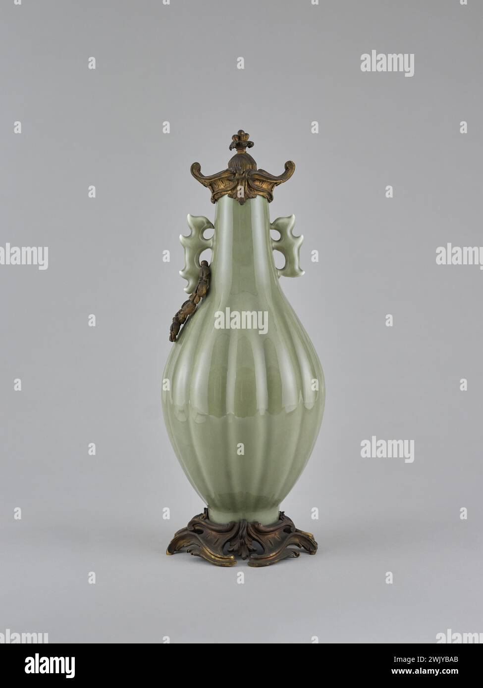 Unknown (n. - d.), Celadon vase (common name). Ceramics, porcelain, golden bronze frame. Petit ...