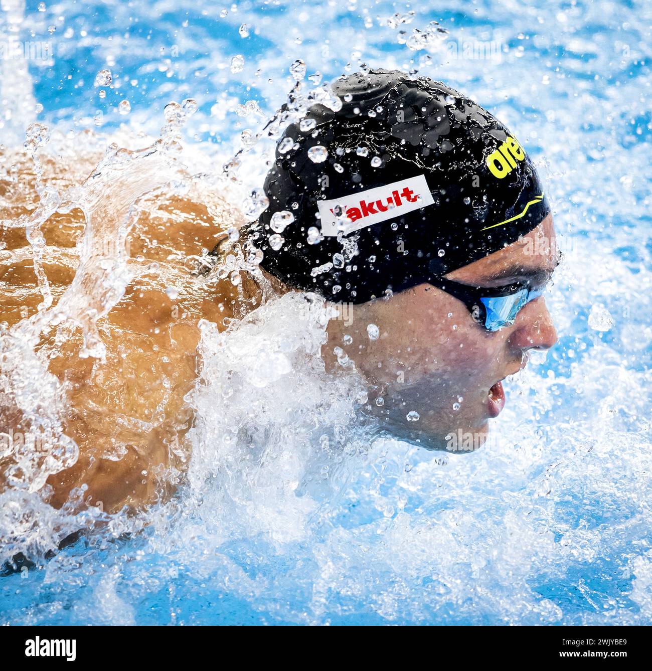 DOHA - Nyls Korstanje in action in the men's 100 butterfly final during ...
