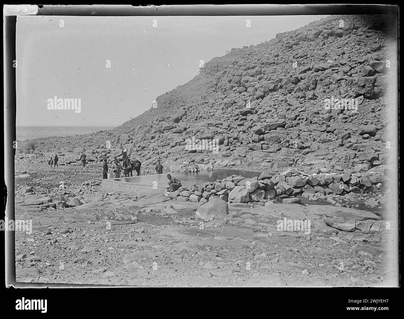 View of Africa - rocky landscape with characters at the edge of a ...