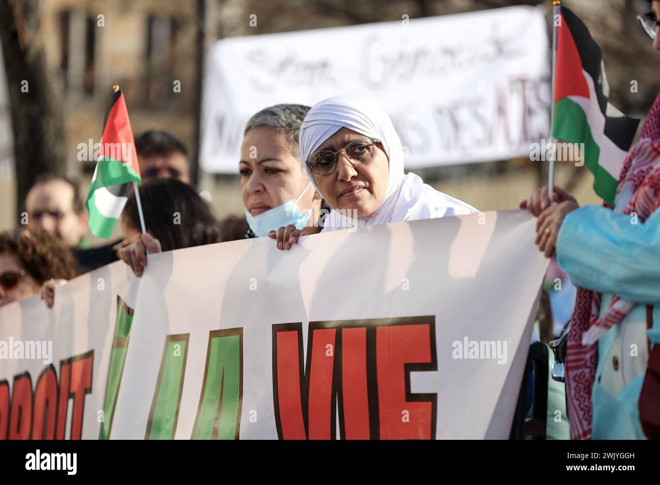 Paris, France. 17th Feb, 2024. A palestinian muslim demonstrator behind ...