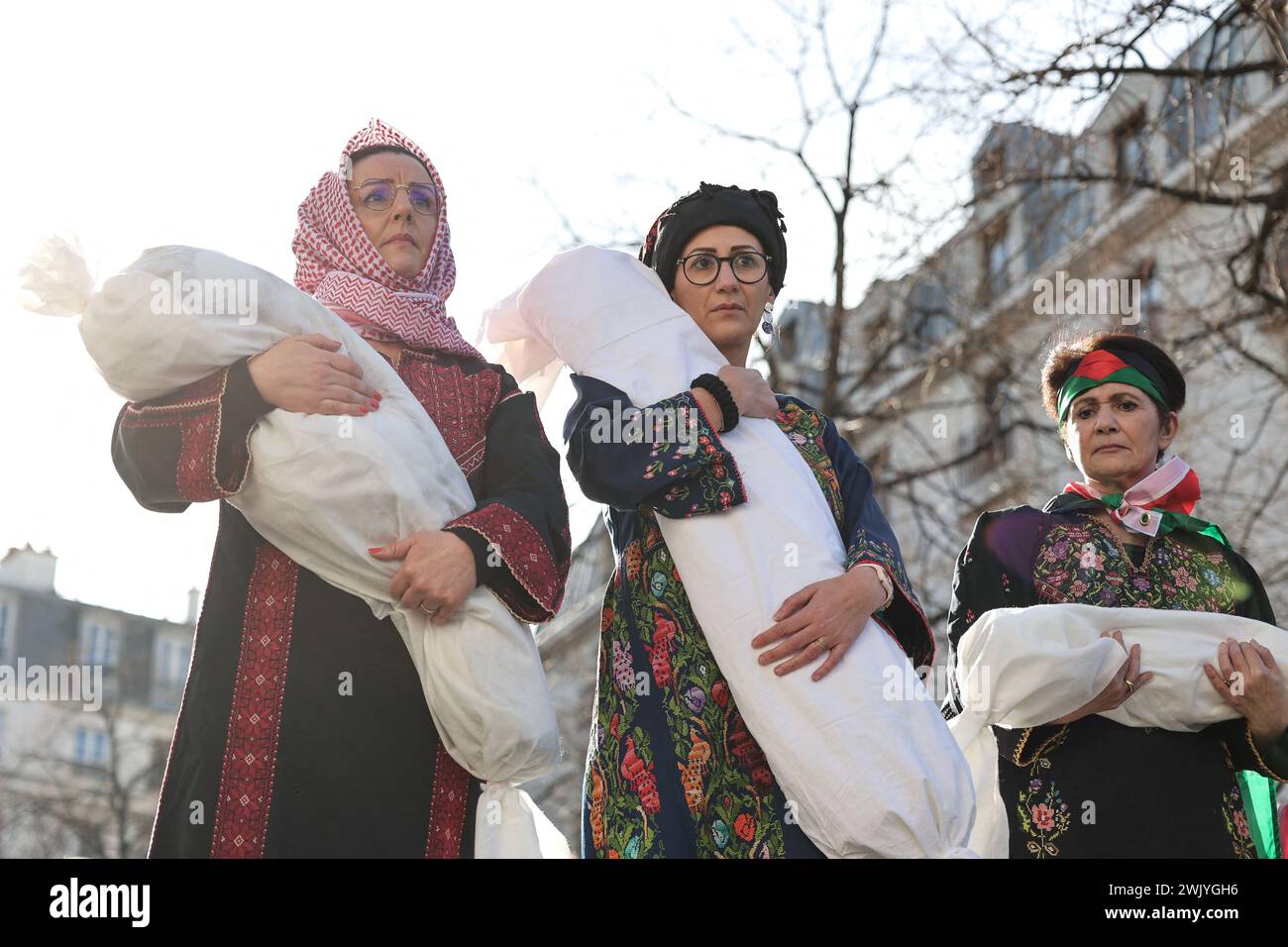 Paris, France. 17th Feb, 2024. Three palestinian protesters in ...