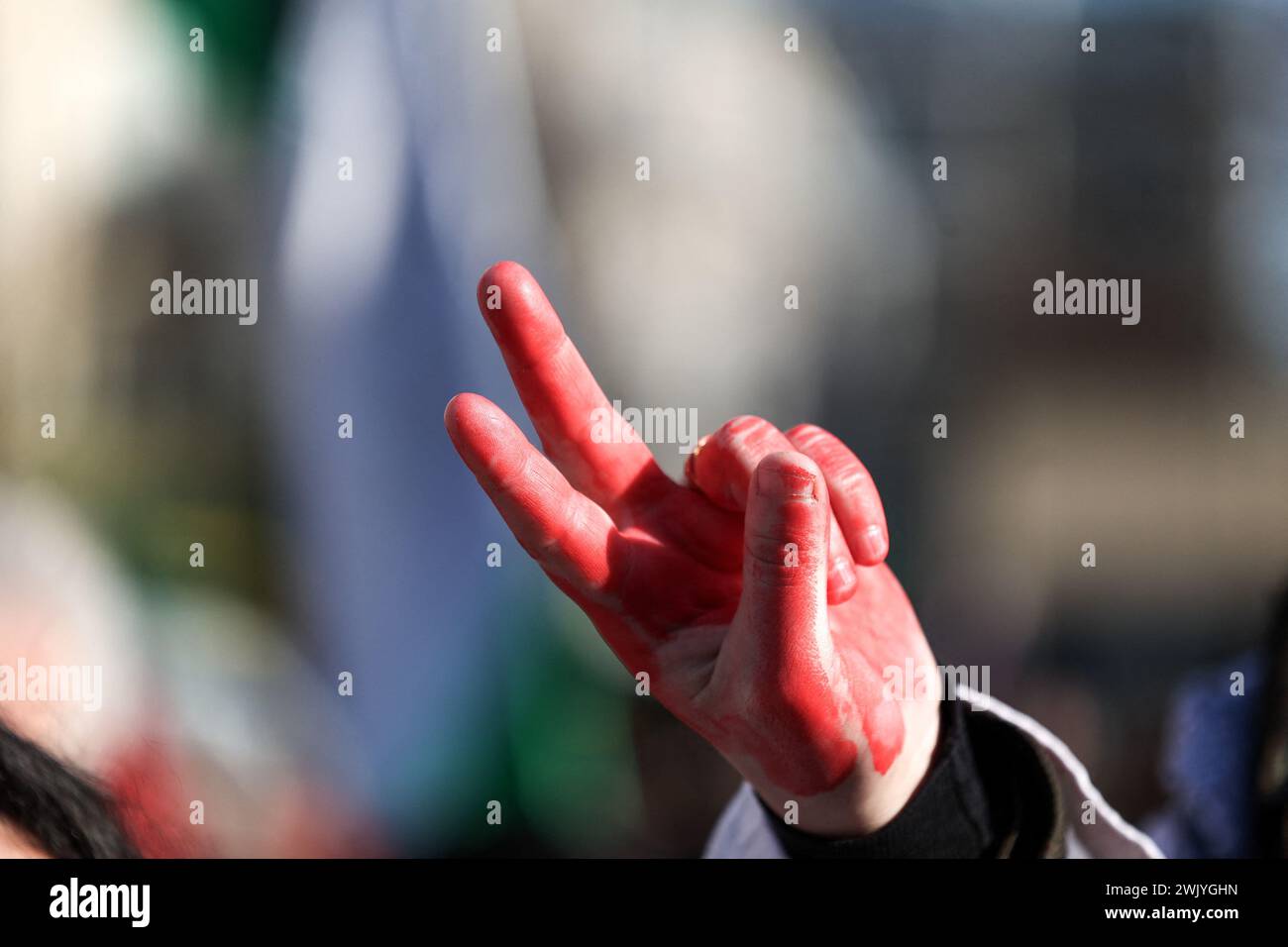 Paris, France. 17th Feb, 2024. A hand with two fingers representing the ...