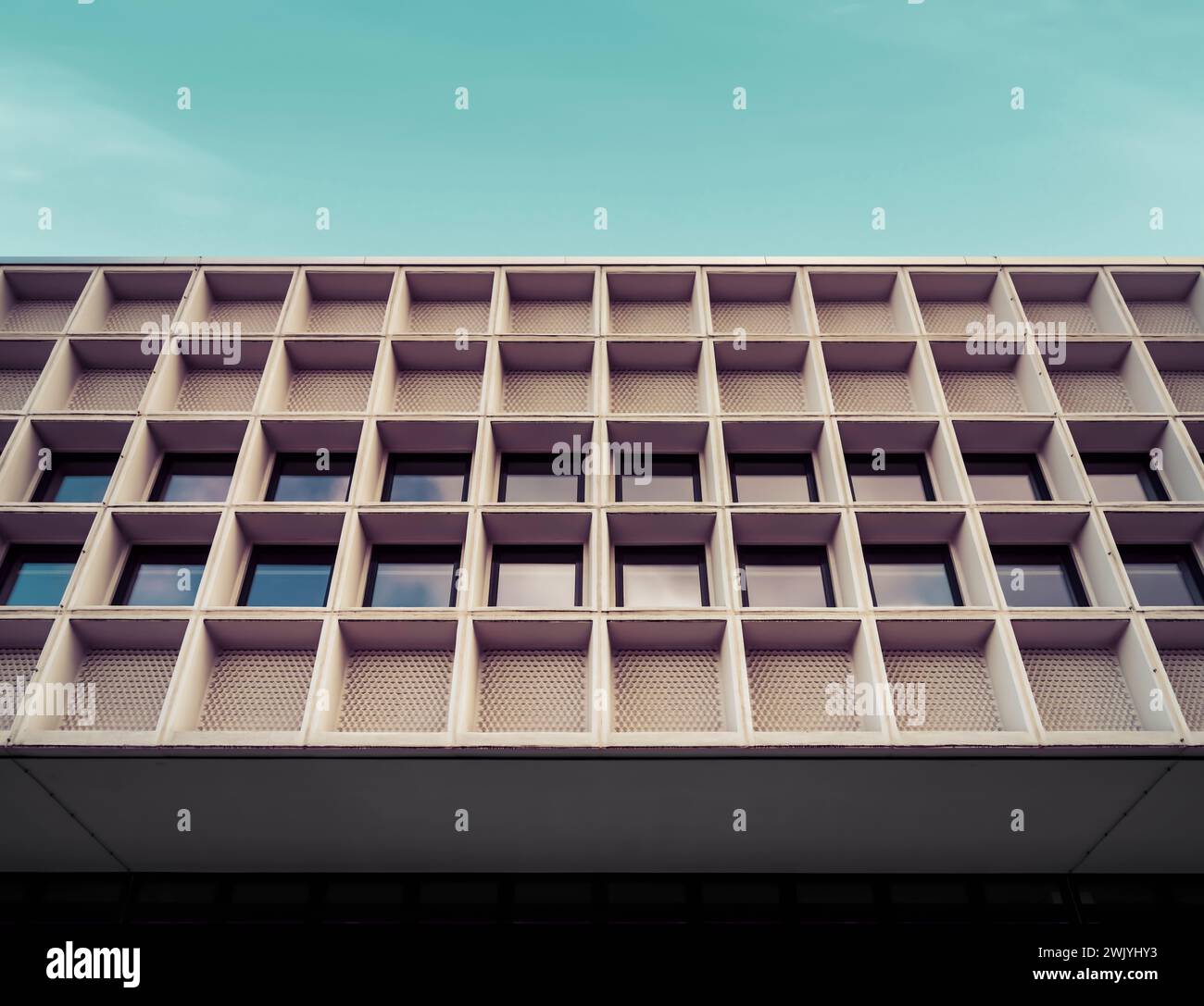 GDR East German prefabricated building with repetitive concrete facade ...