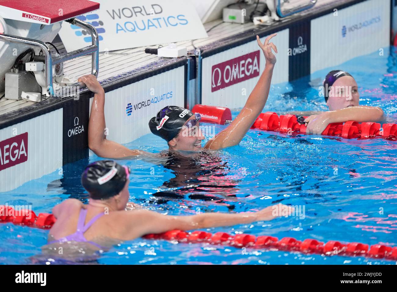 Simona Quadarella of Italy, center, reacts near Isabel Gose of Germany ...