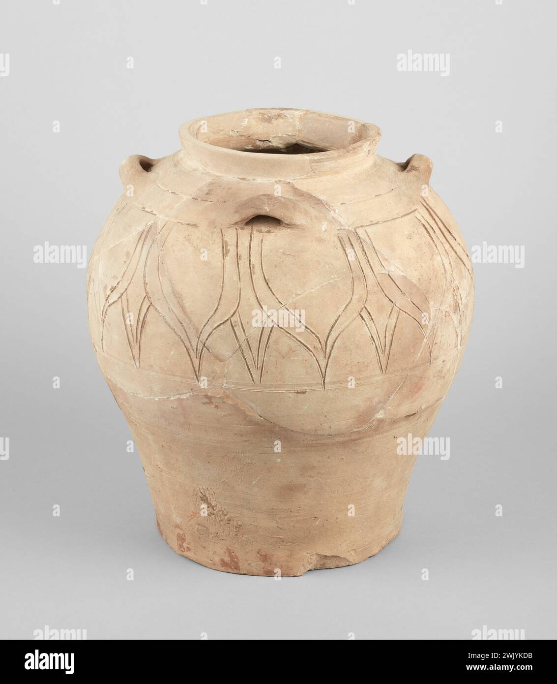 Anonymous, jar (usual name), 0600. Sandstone with incised decoration ...
